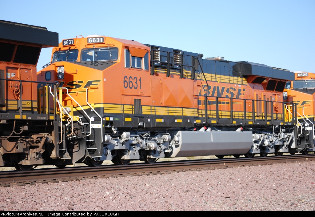 BNSF 6631 basks in the late afternoon sun's rays with her sister BNSF 6629 behind her.